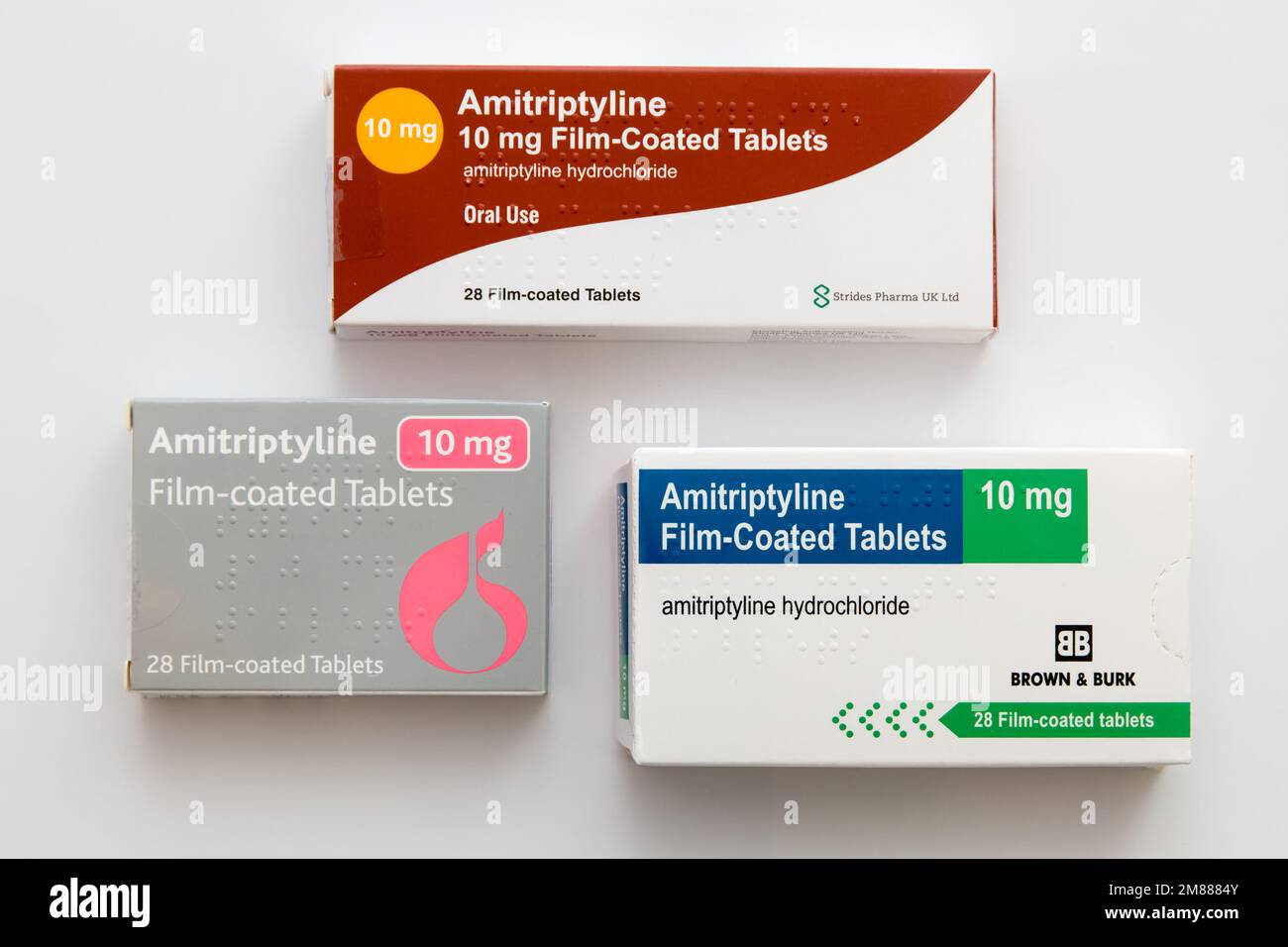 Boxes Of Various Generic Brands Of 10mg Amitriptyline Hydrochloride Tablets On White Background