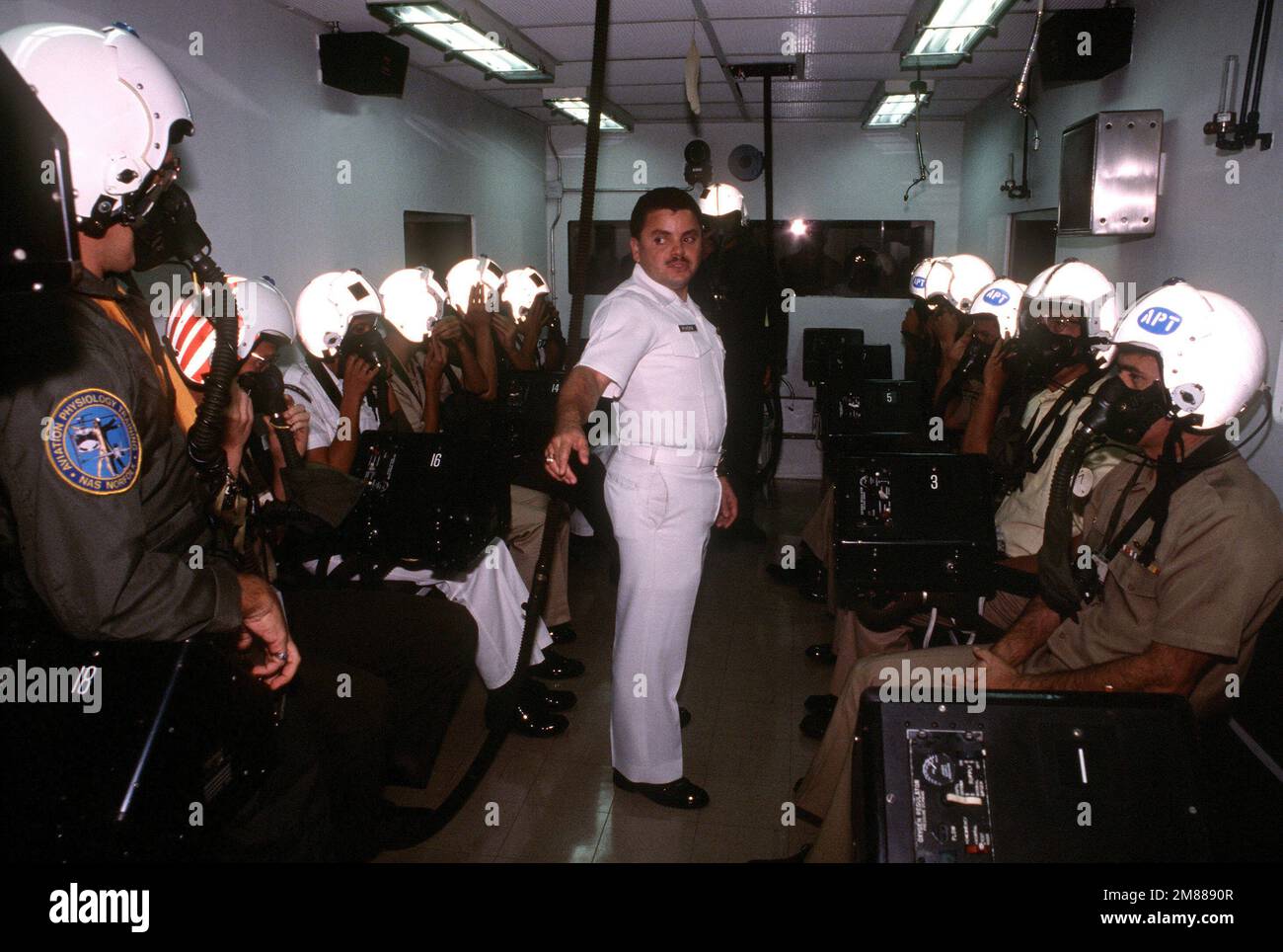 A hospital corpsman explains to students at the station's Aviation ...