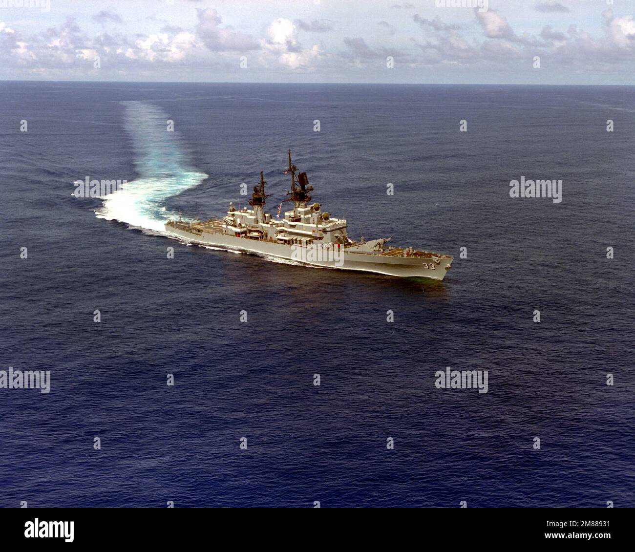 A starboard bow view of the guided missile cruiser USS FOX (CG-33 ...