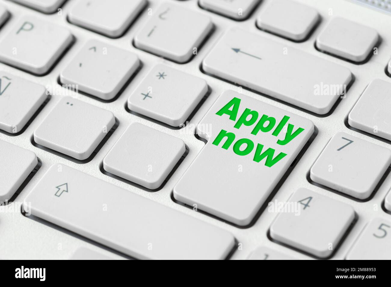 Closeup of a highlighted key on the keyboard of a laptop showing the ...