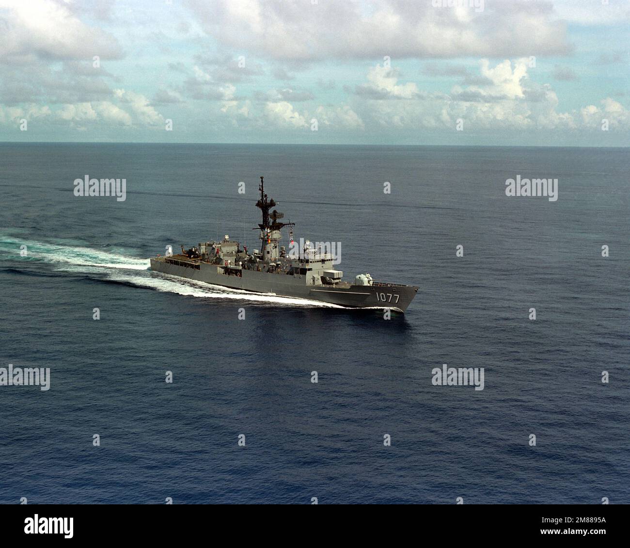 A starboard bow view of the frigate USS OUELLET (FF-1077) underway ...