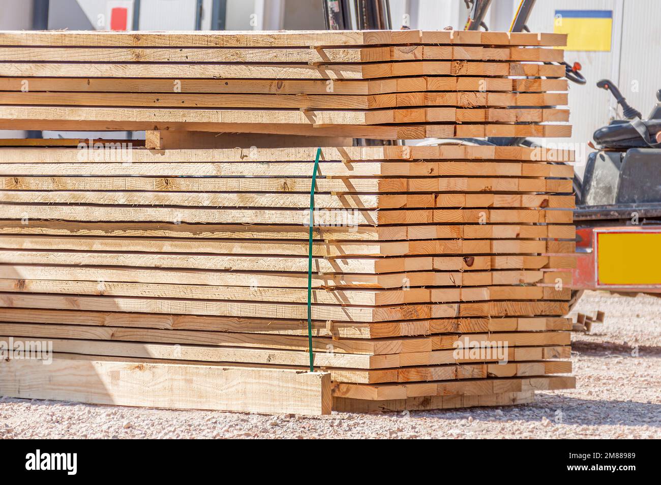 Stack of new wooden studs at the lumber yard Stock Photo - Alamy