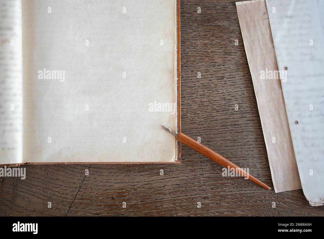 Top view of a old paper and pen with copy space Stock Photo - Alamy