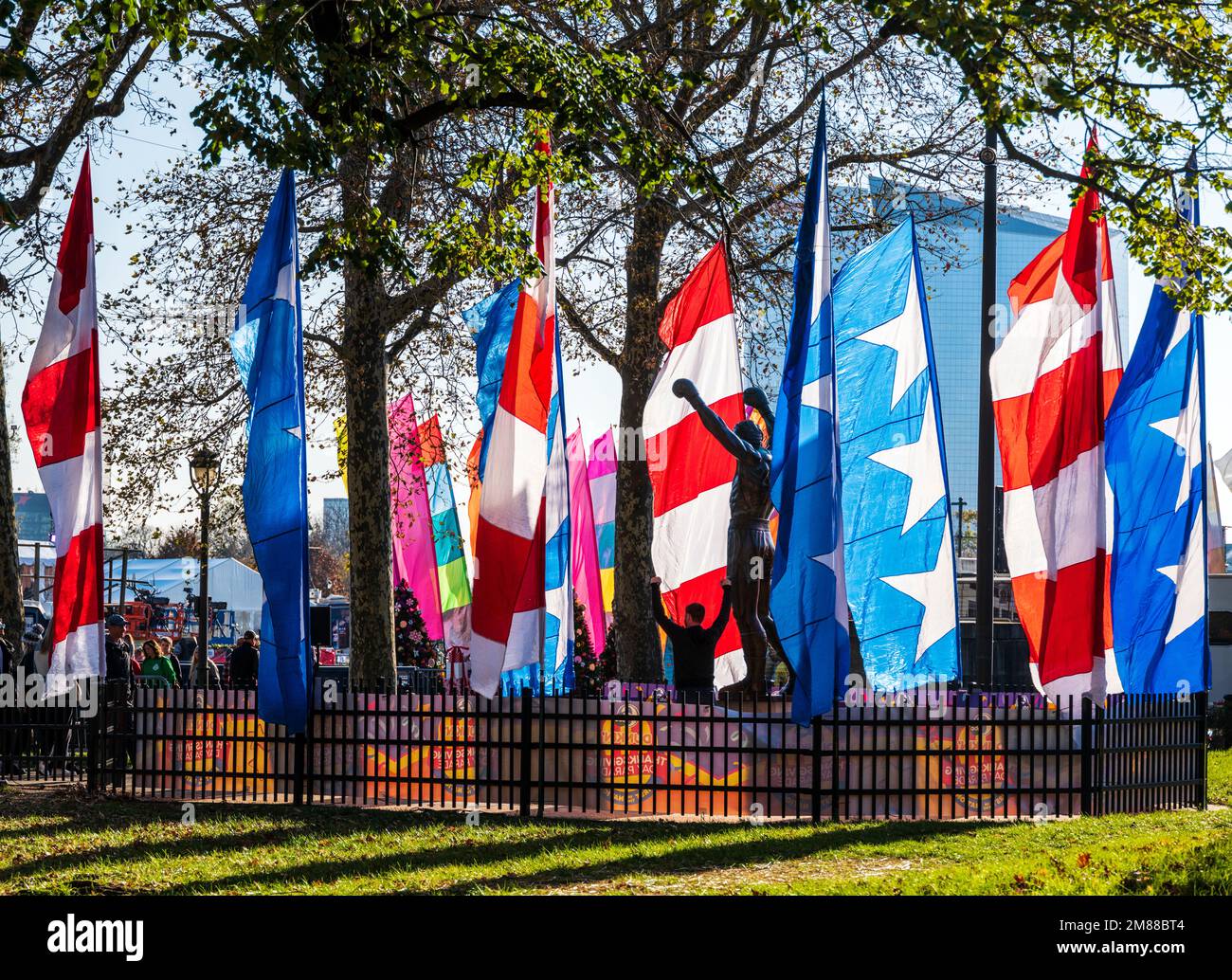 Tourists pose for pictures; famous Rocky Balboa statue; Philadelphia ...