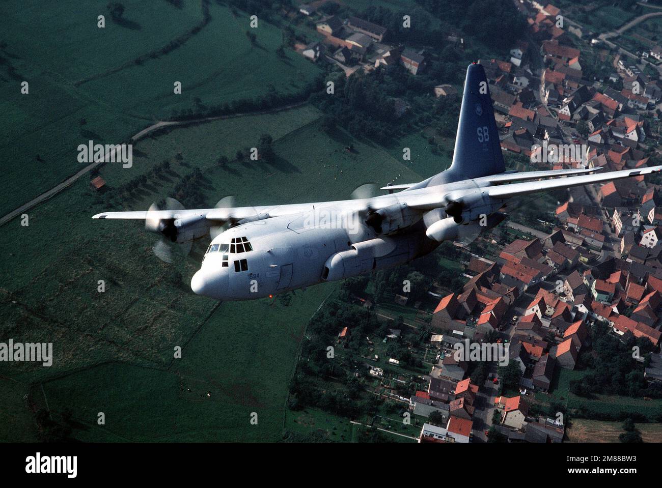 An air-to-air left front view of a 43rd Electronic Combat Squadron EC ...