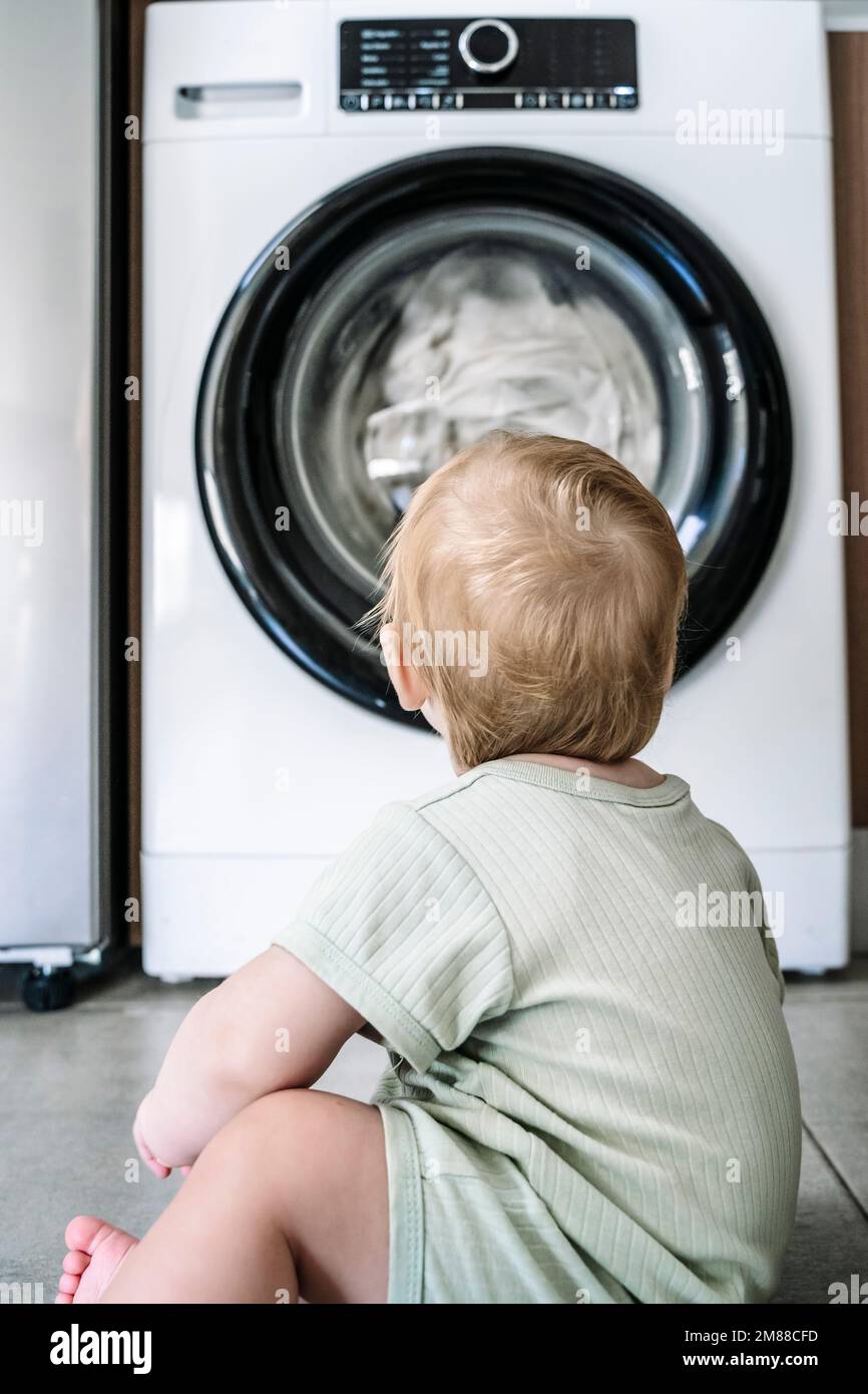 Child washing machine hi-res stock photography and images - Alamy