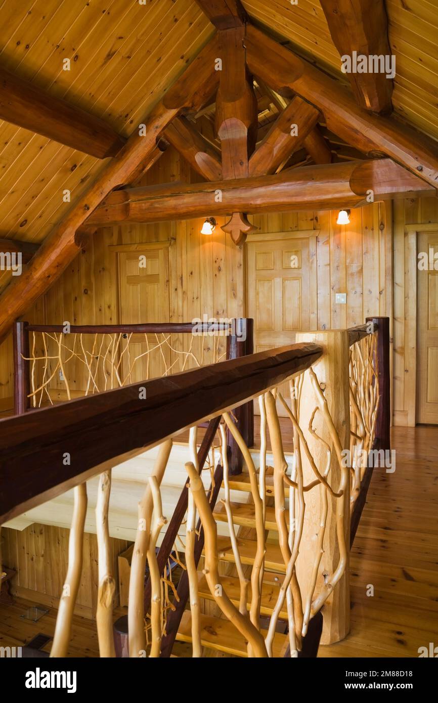 Cedar branch railings and red pine wood floorboards on upstairs floor ...