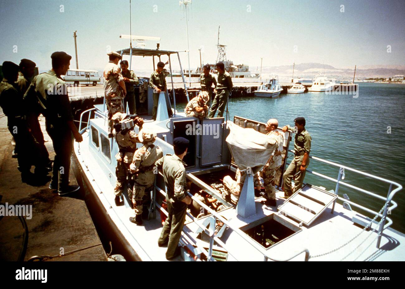 US military personnel tour a Jordanian coast guard cutter during SHADOW ...