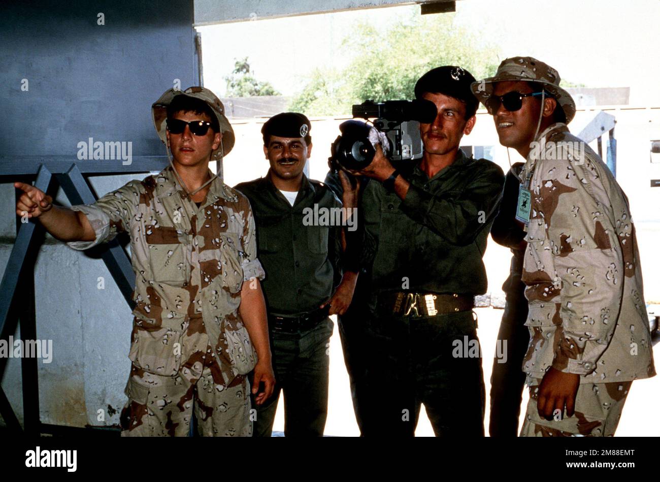 A member of the Jordanian military looks through the lens of a US Navy ...