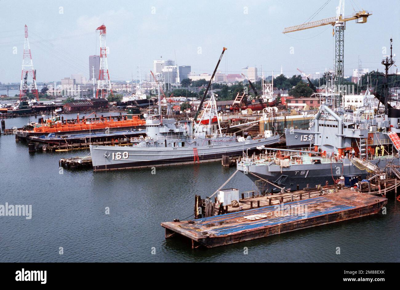 A view of, from left: the fleet tugs PAPAGO (ATF 160) and PAIUTE (ATF ...