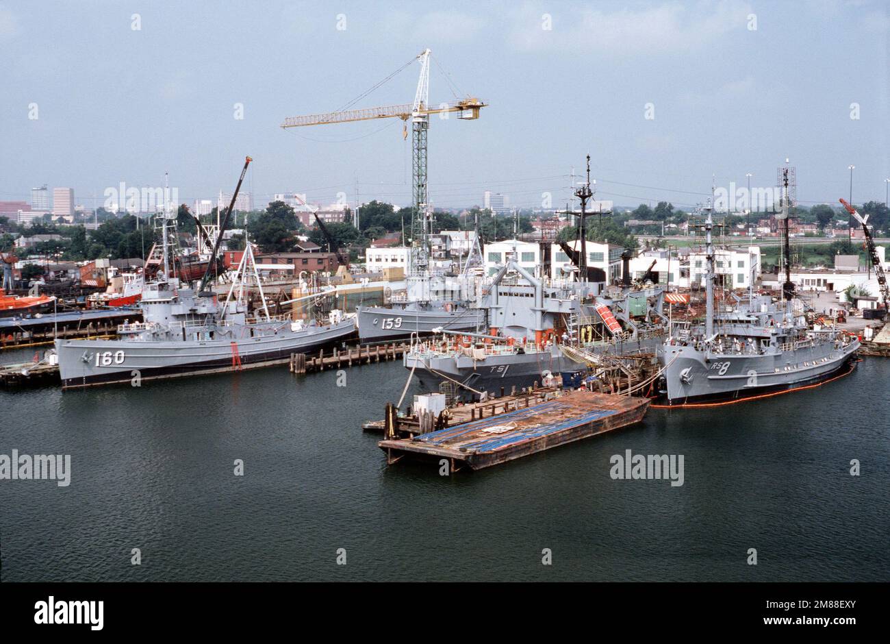 A view of, from left: the fleet tugs PAPAGO (ATF 160) and PAIUTE (ATF ...