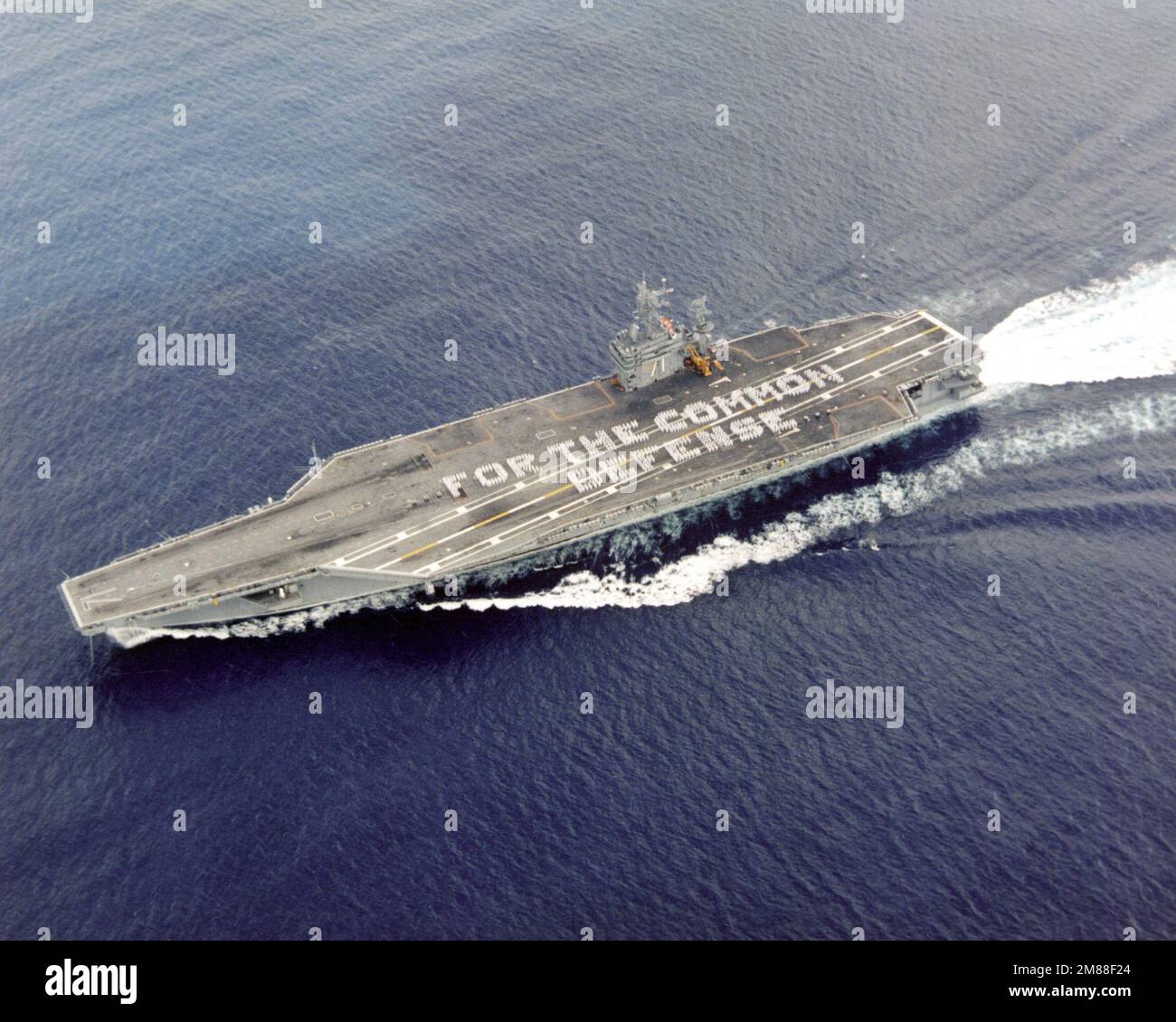 An aerial port view of the nuclear-powered aircraft carrier USS THEODORE ROOSEVELT (CVN-71 ...