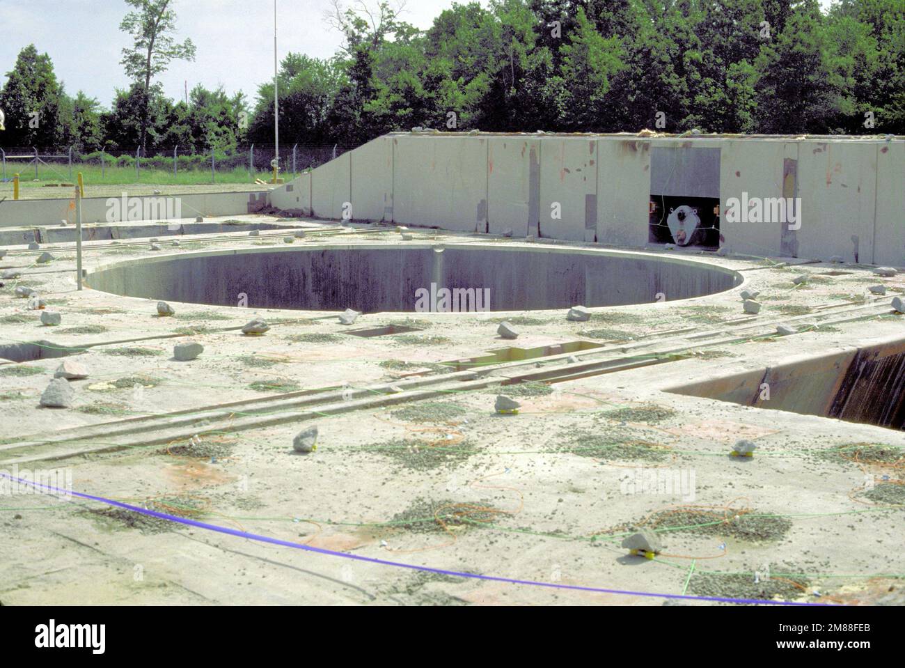 Holes have been drilled deep into the concrete of a Titan II missile ...