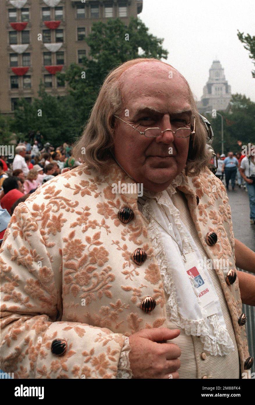 An actor portrays Benjamin Franklin during a parade celebrating the ...