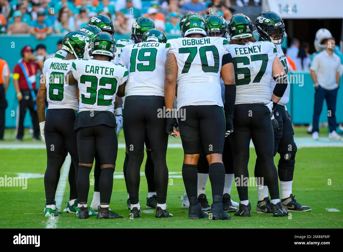 New York Jets quarterback Joe Flacco (19) calls a play in the huddle ...