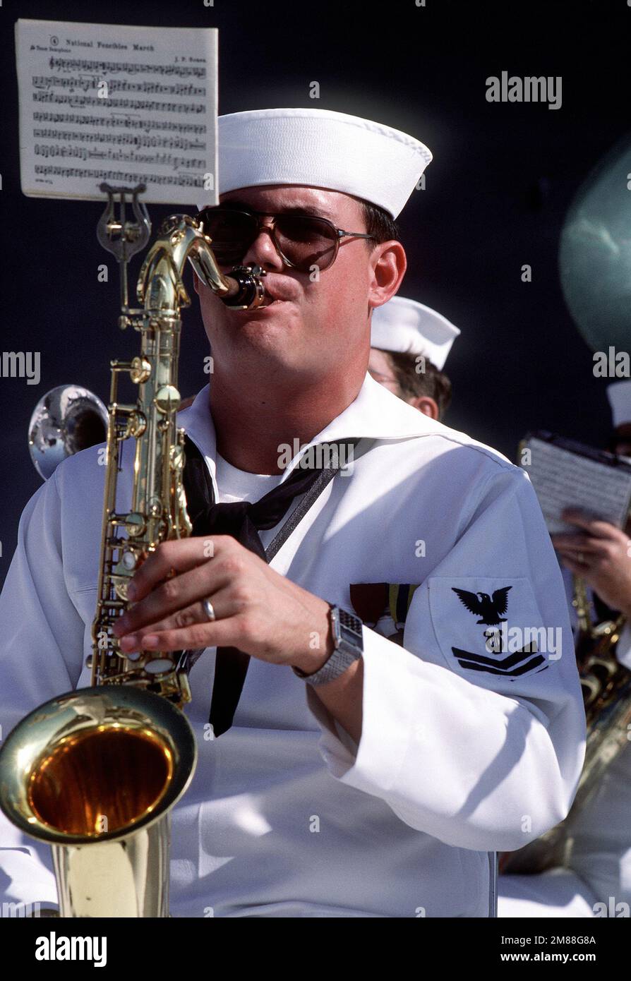 A saxophone player performs during the commissioning ceremony of the ...