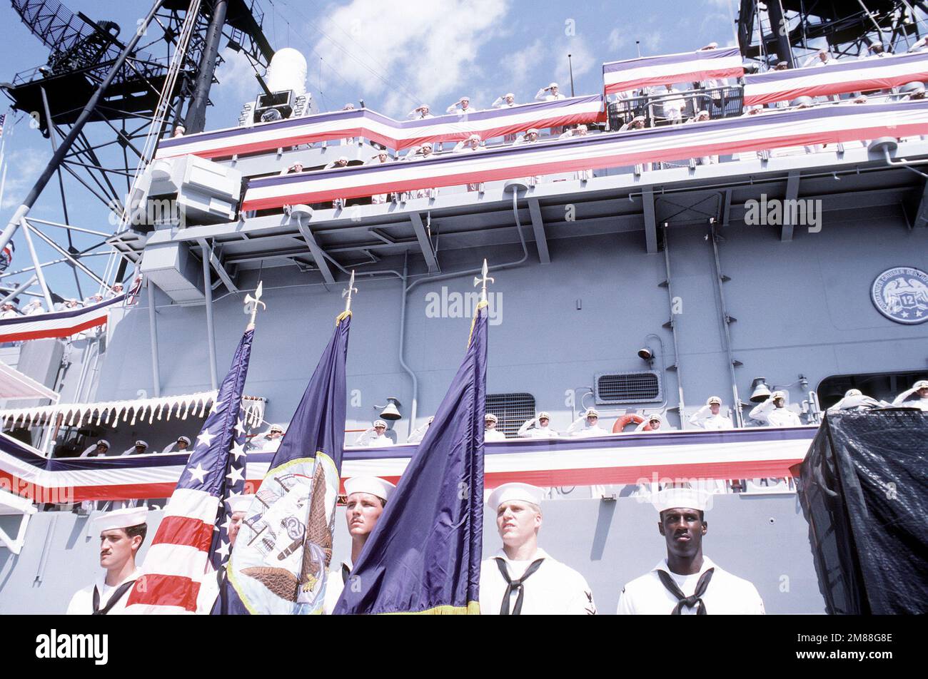 Navy color guard stands at attention during the commissioning ceremony ...