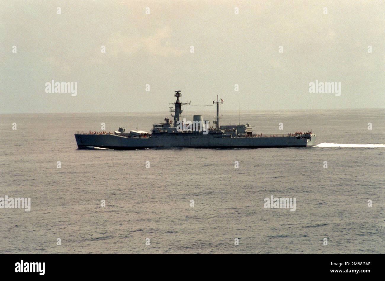 A port beam view of a British Leander Class frigate underway. Country ...