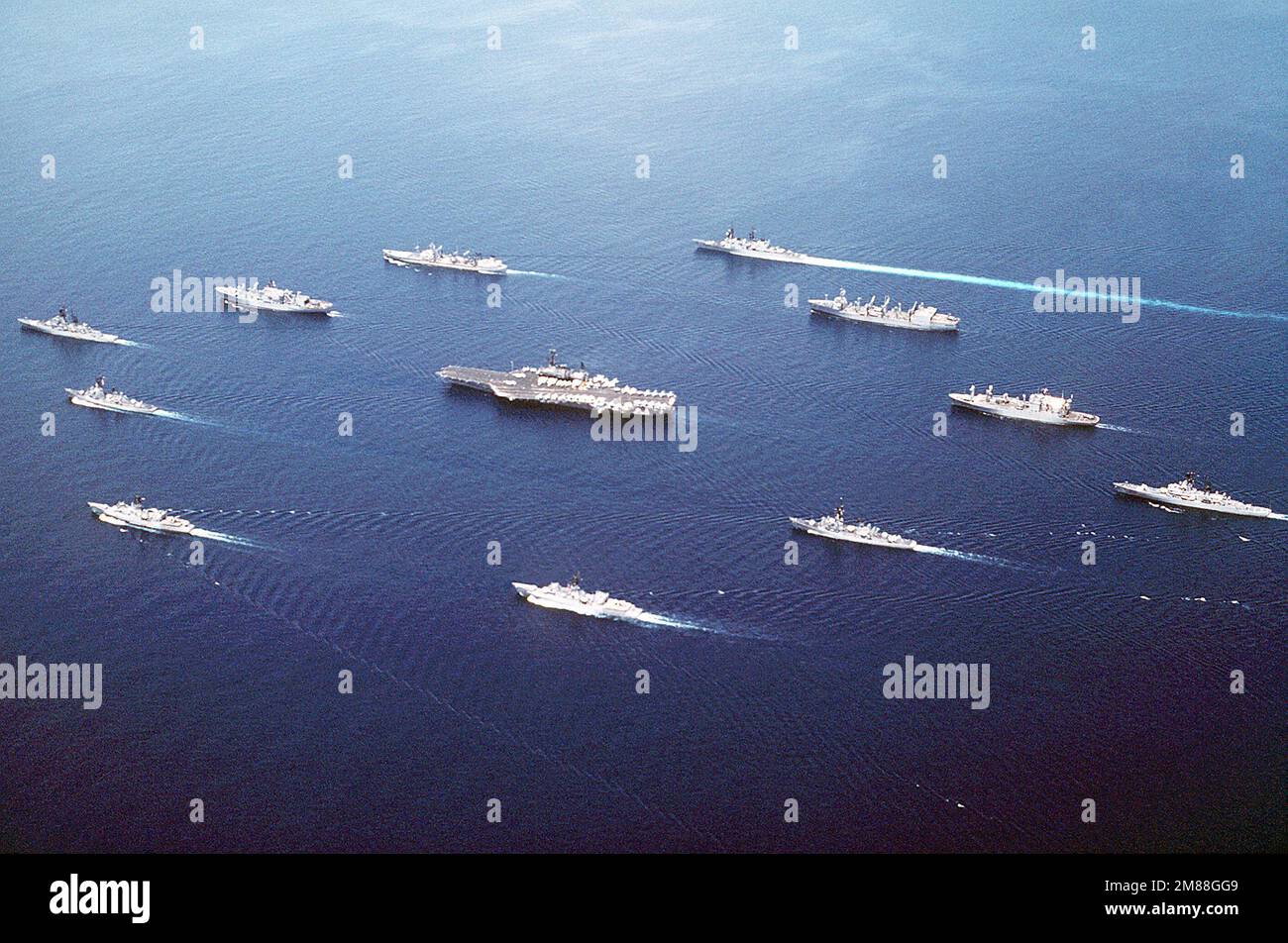 Aerial port view of Battle Group Alfa underway. The ships are ...