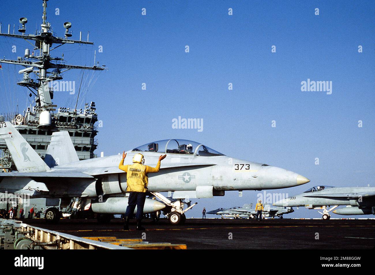 A Strike-Fighter Squadron 106 (VFA-106) TA/F-18 Hornet aircraft is ...