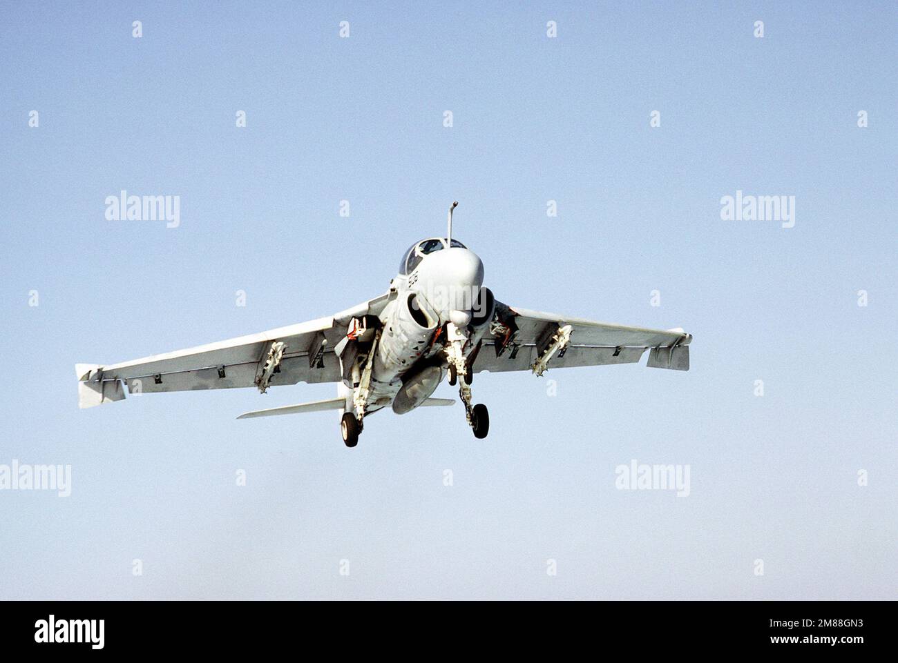 A front view of an A-6E Intruder aircraft with its landing gear down ...