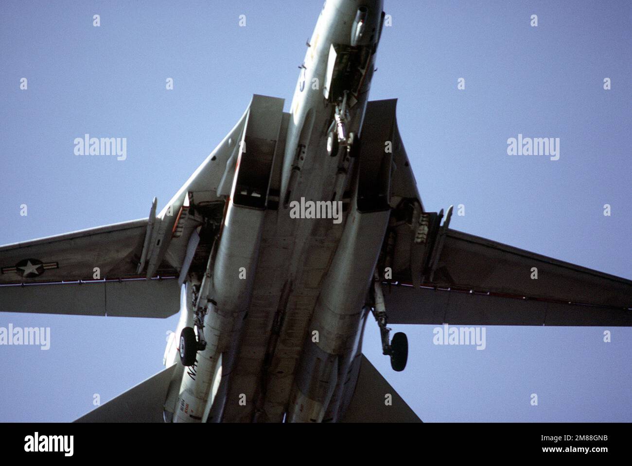 An underside view of a Fighter Squadron 101 (VF-101) F-14A Tomcat ...