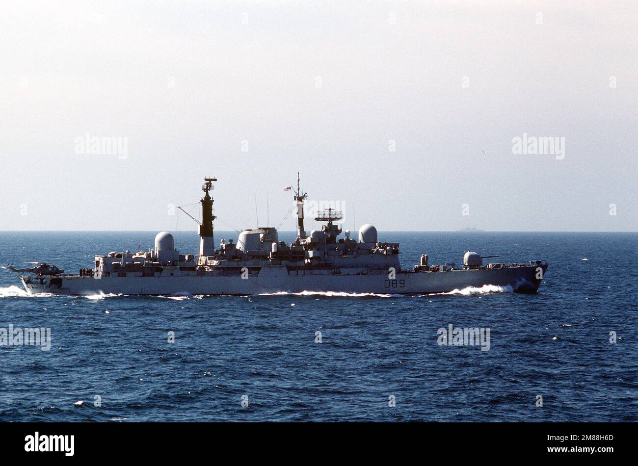 A starboard beam view of the British destroyer HMS EXETER (D-89 ...