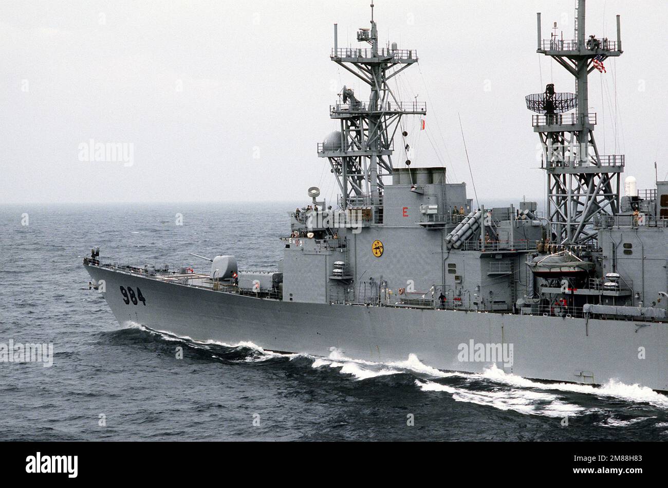 A port view of the destroyer USS LEFTWICH (DD-984) underway as part of ...
