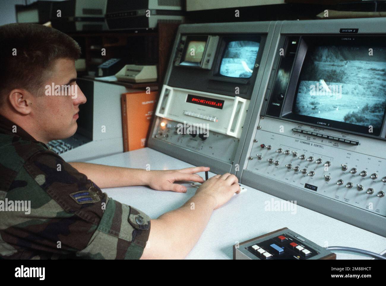 SRA David F. Makowski works at the operator's console for the ...