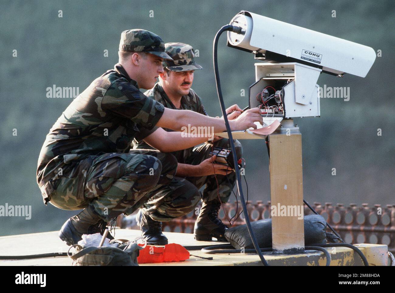 SRA David F. Makowki, left, and SSGT Russell R. Roby repair a ...