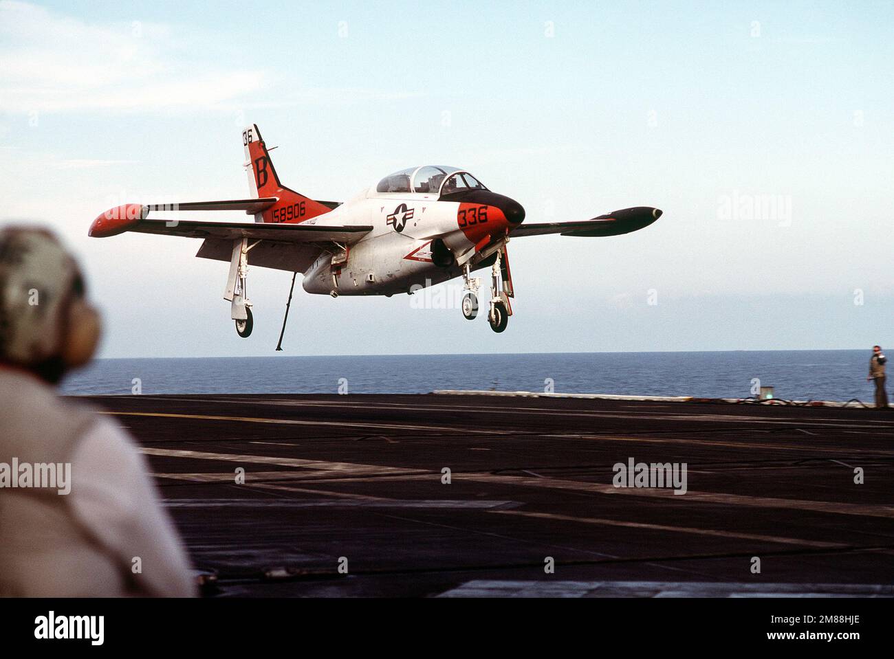 A T-2C Buckeye aircraft prepares to land aboard the nuclear-powered ...