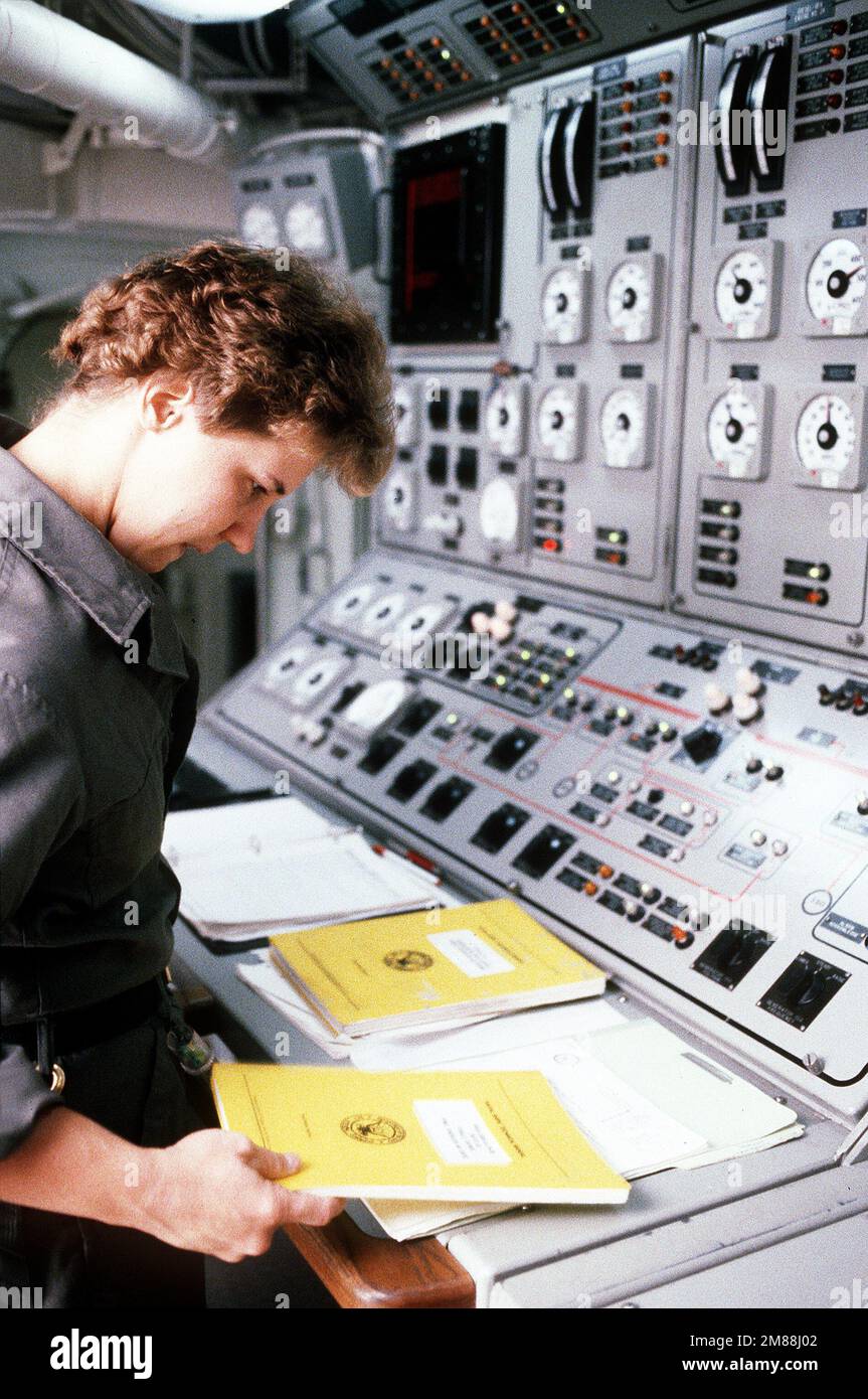 Interior Communications Technician 2nd Class Lori Richards works at the ...