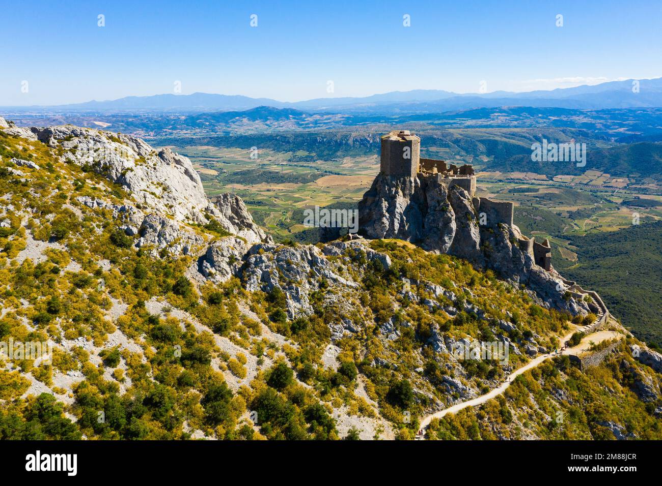 Drone view of ruins of Castle de Queribus on stone peak, France Stock ...
