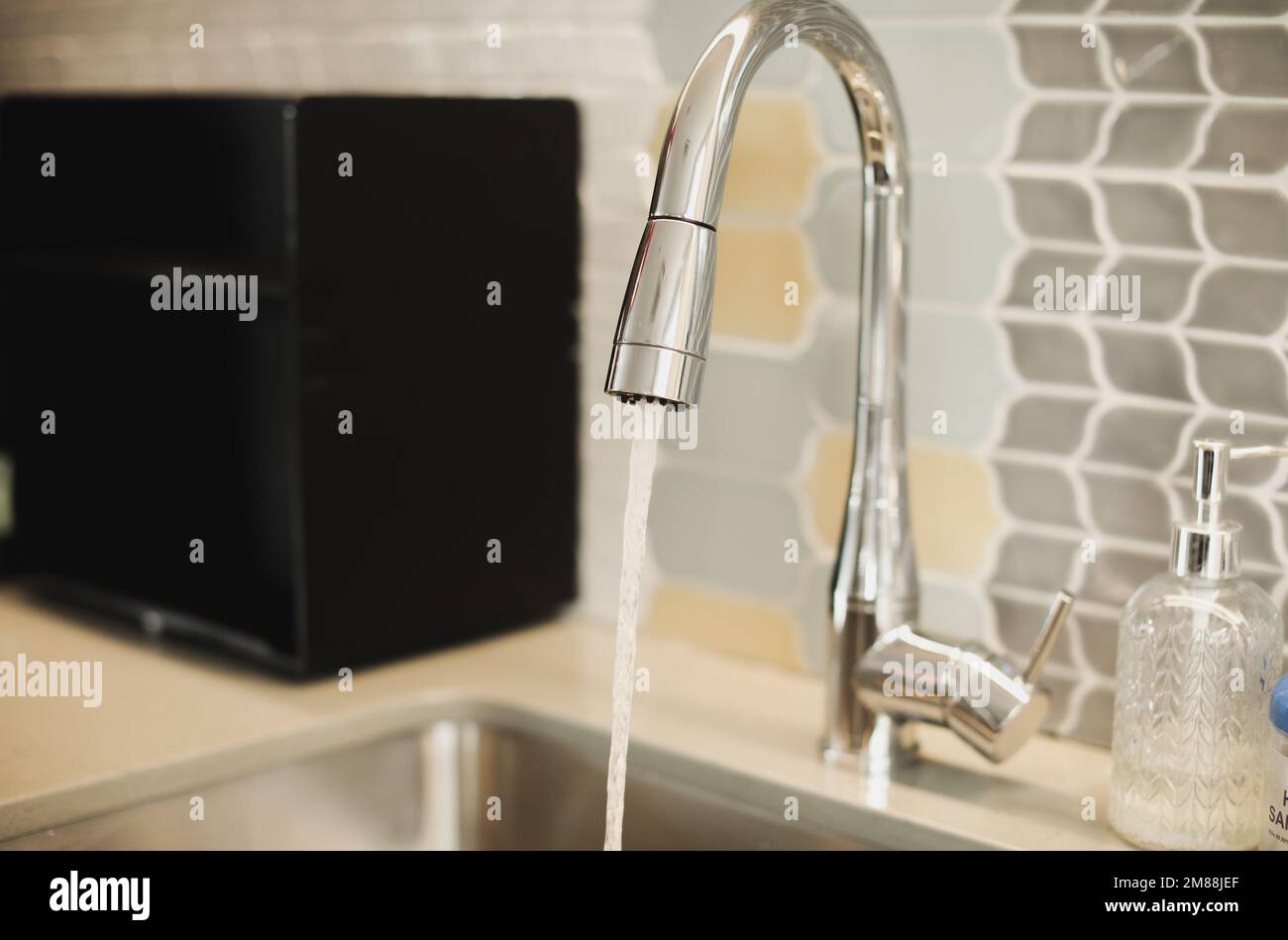 water skin drain kitchen faucet wash plumbing Stock Photo - Alamy