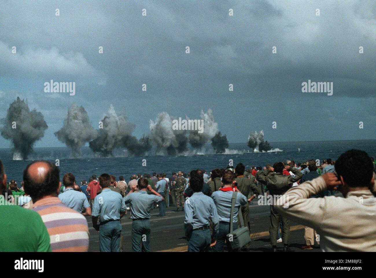 Crewmen and spectators aboard the aircraft carrier USS CONSTELLATION ...