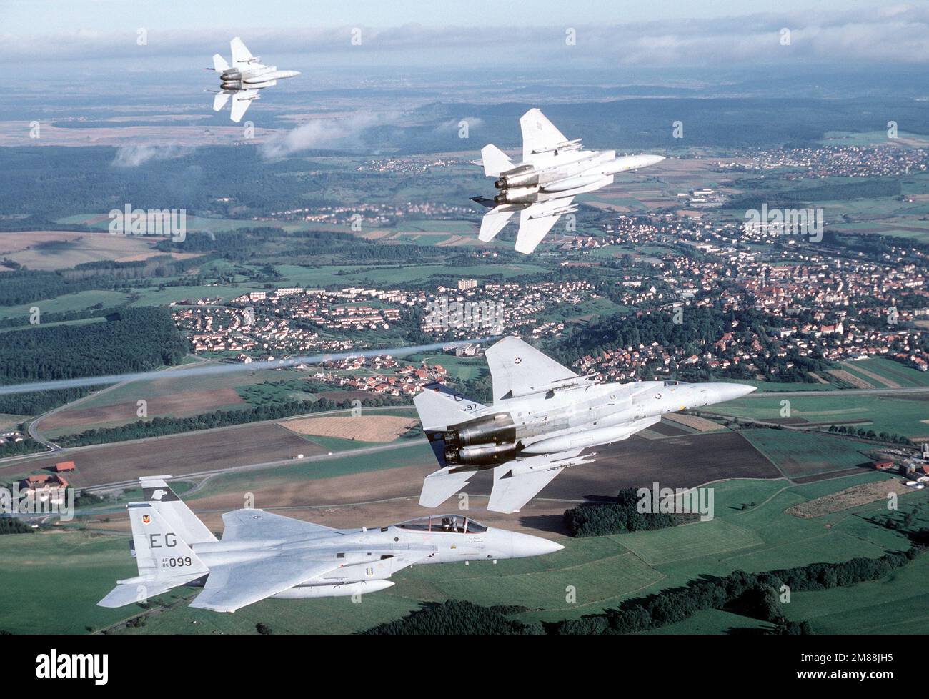 A formation of four 58th Tactical Fighter Squadron F-15C Eagle aircraft ...