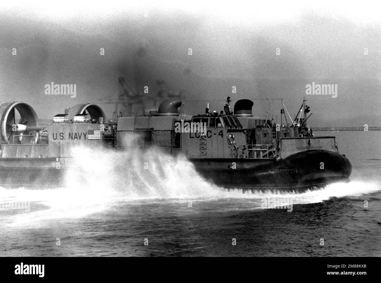 The air cushion landing craft LCAC-4 comes ashore during an amphibious ...