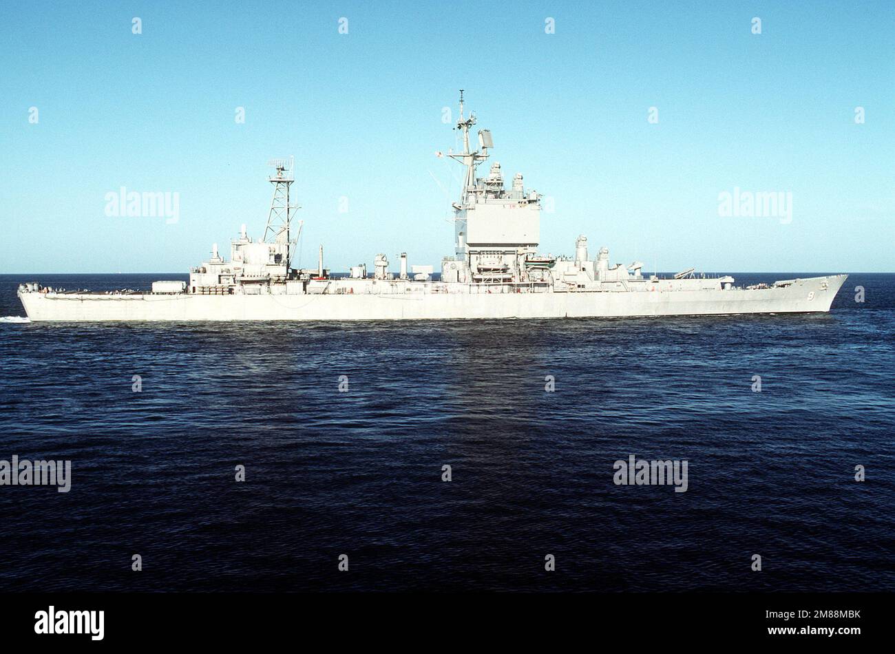 A starboard beam view of the nuclear-powered guided missile cruiser USS ...