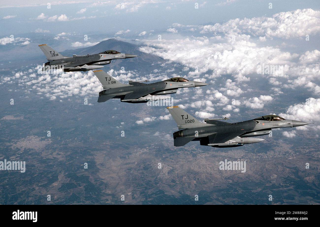 An air-to-air-right side view of three 613th Tactical Fighter Squadron ...