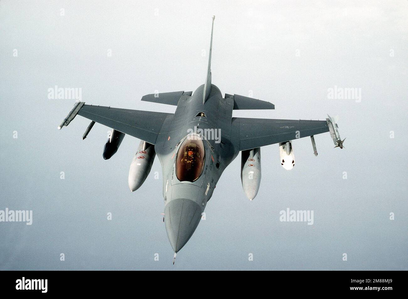 An air-to-air front view of a 613th Tactical Fighter Squadron F-16A ...