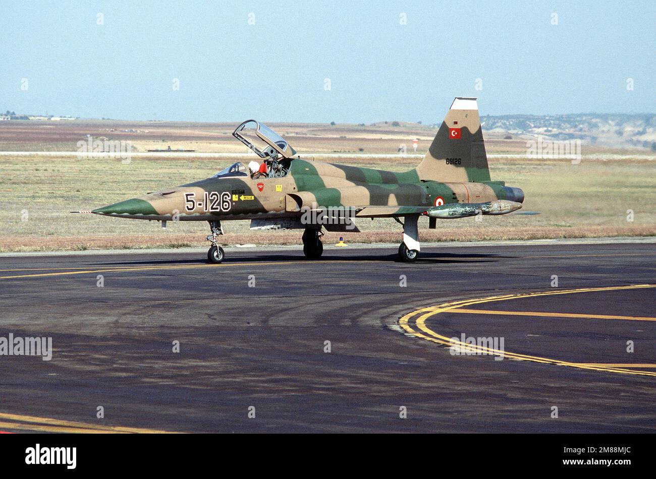 An F-5A Freedom Fighter aircraft of the Turkish air force taxis on the flight line at Incirlik ...