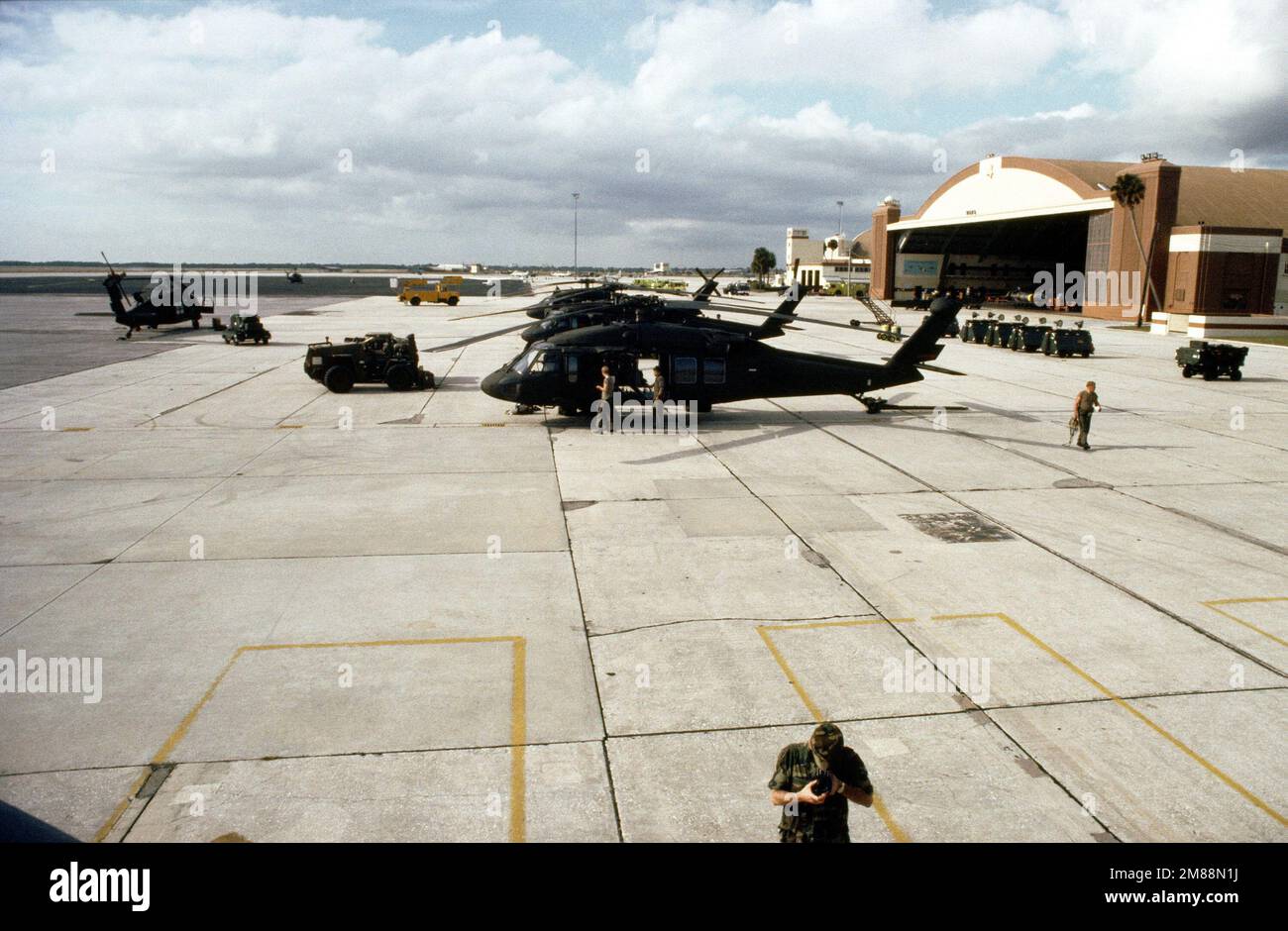 UH-60 Black Hawk helicopter stand on the flight line during Operation ...