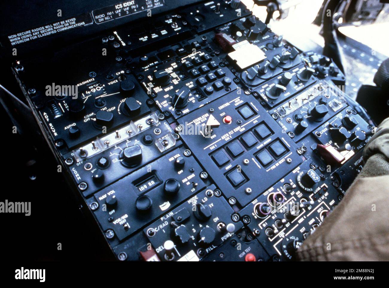 A view of the control panels in a UH-60A Black Hawk helicopter during ...