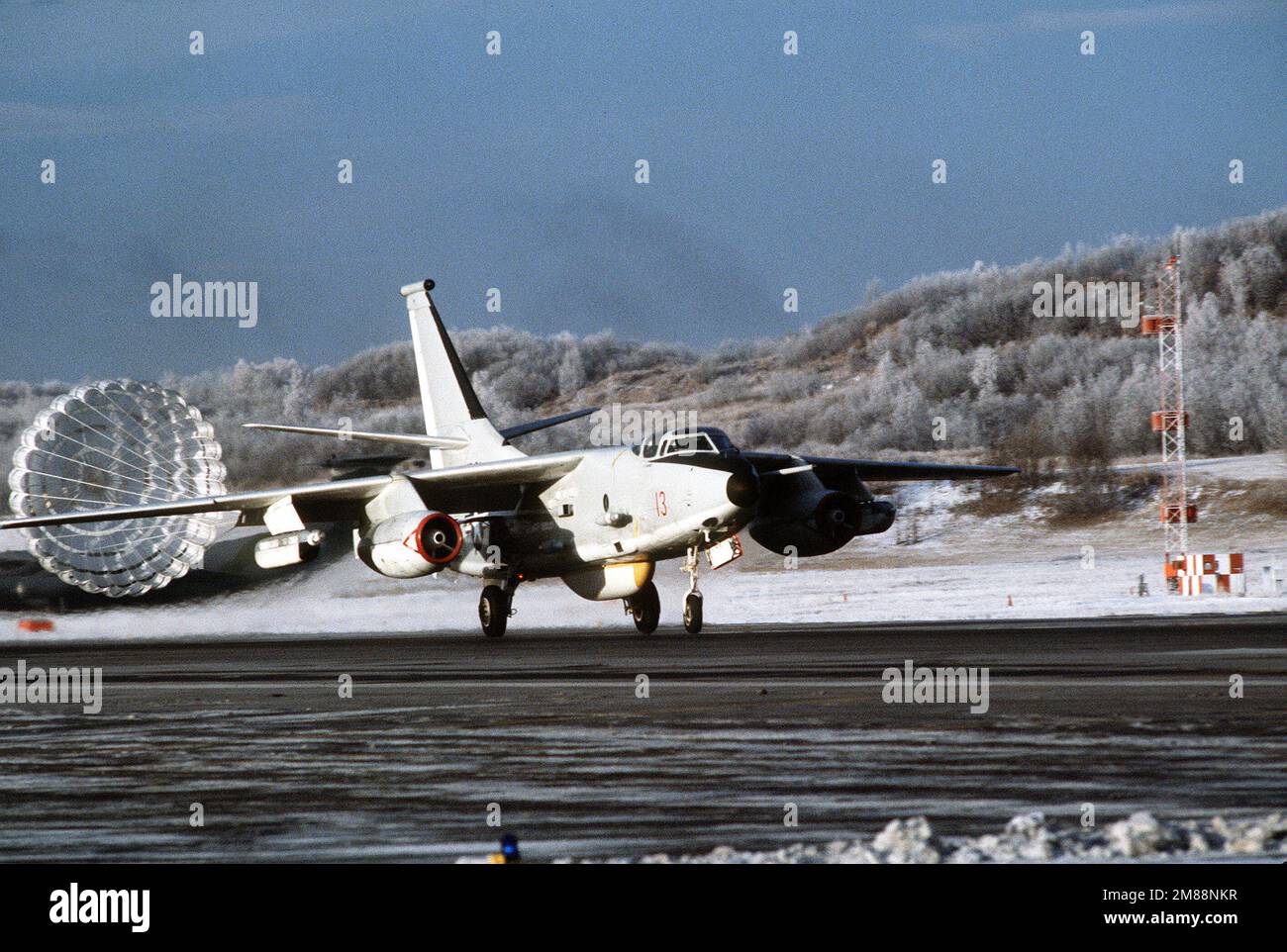 A drag chute opens as an A-3 Skywarrior aircraft lands during the U.S ...
