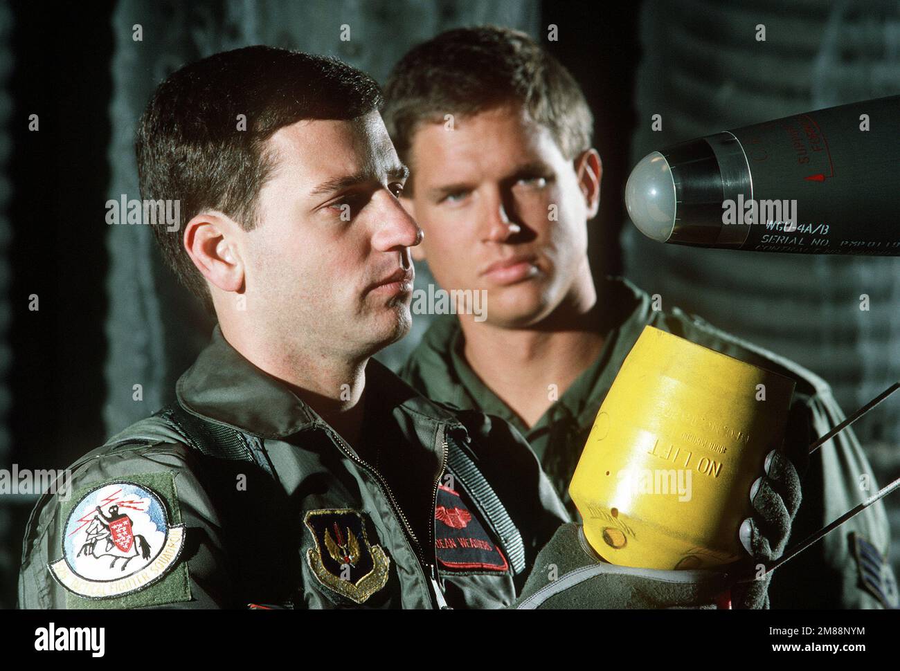 1LT Dean Weathers, left, an F-16C Fighting Falcon aircraft pilot with ...