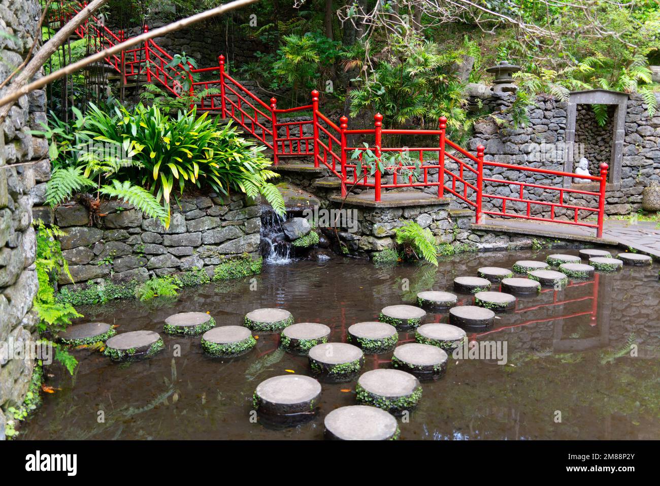 A beautiful Monte Palace tropical garden in Madeira, Portugal, with a ...
