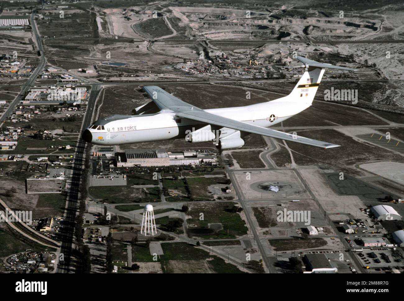 Air to air left side view of a C-141B Starlifter, "Spirit of the Inland ...