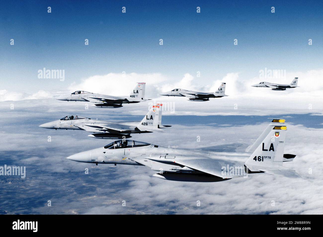 Air to air left side view of a formation of five F-15 Eagle fighters ...