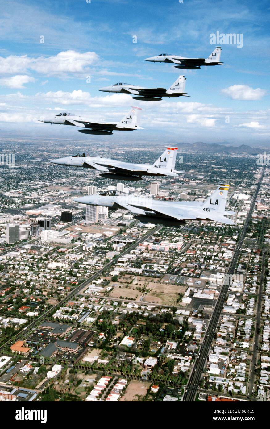 Air to air left side view of a formation of five F-15 Eagle fighters ...