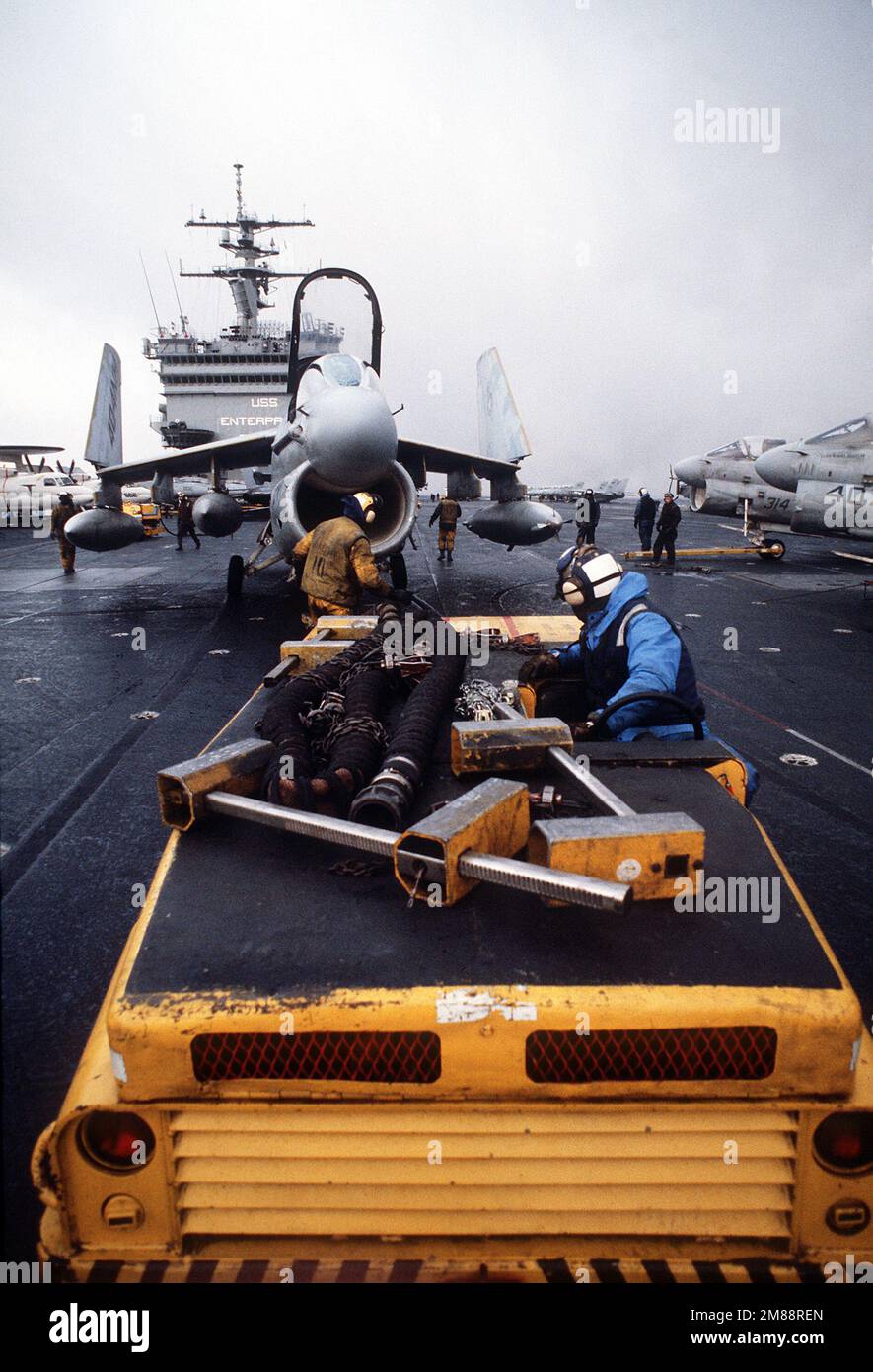 With members of the plane's handling crew posted at all points around ...